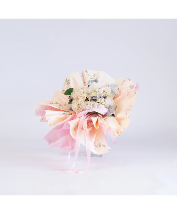 CELOFÁN OPAK CREMA CON FLORES Y DOBLE CARA ROSA 70cm. x 50mts.